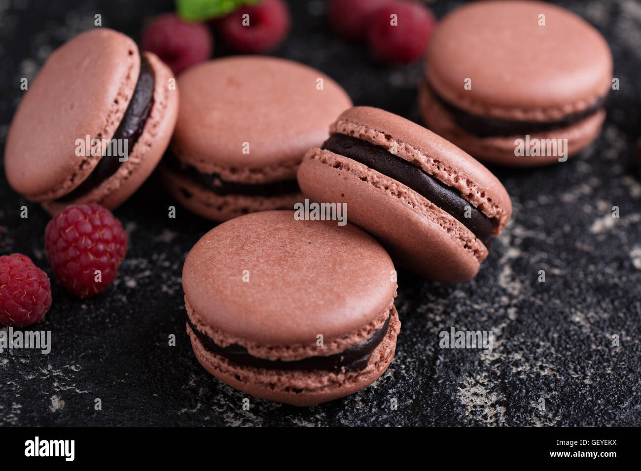 Chocolate and raspberry french macarons with ganache filling Stock ...