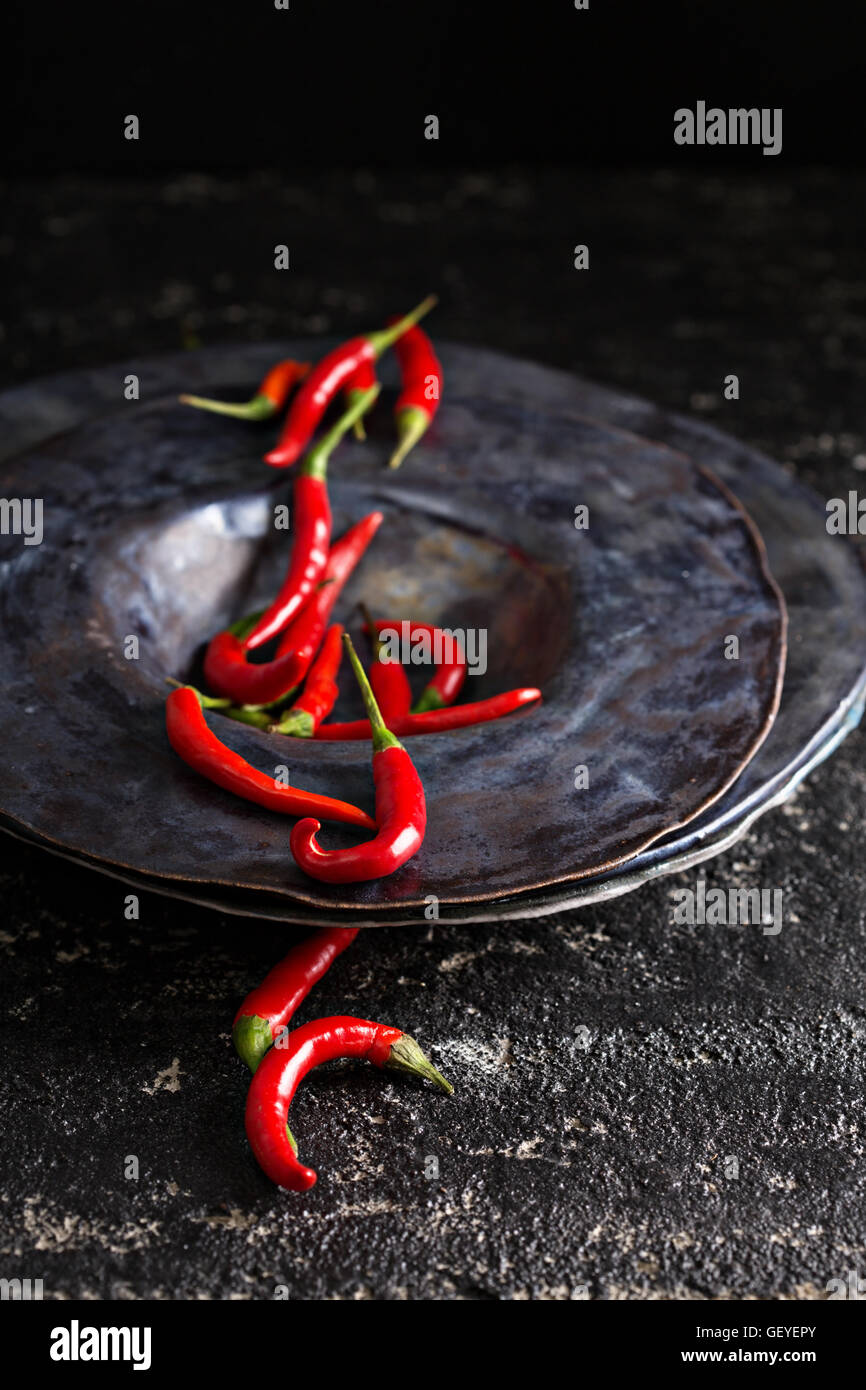 Red chili peppers in a cup Stock Photo - Alamy