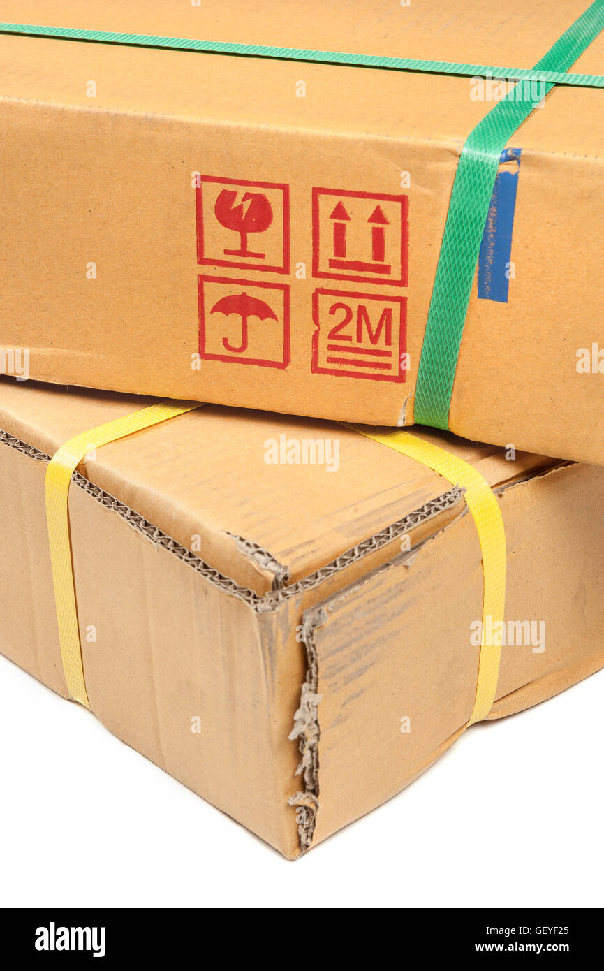 closeup detail of freight parcel with plastic strap Stock Photo - Alamy