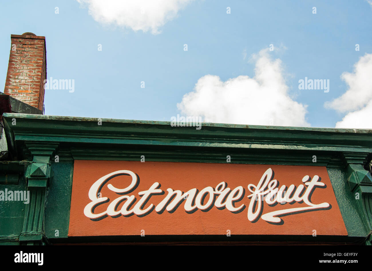 'Eat more fruit'. sign Stock Photo - Alamy