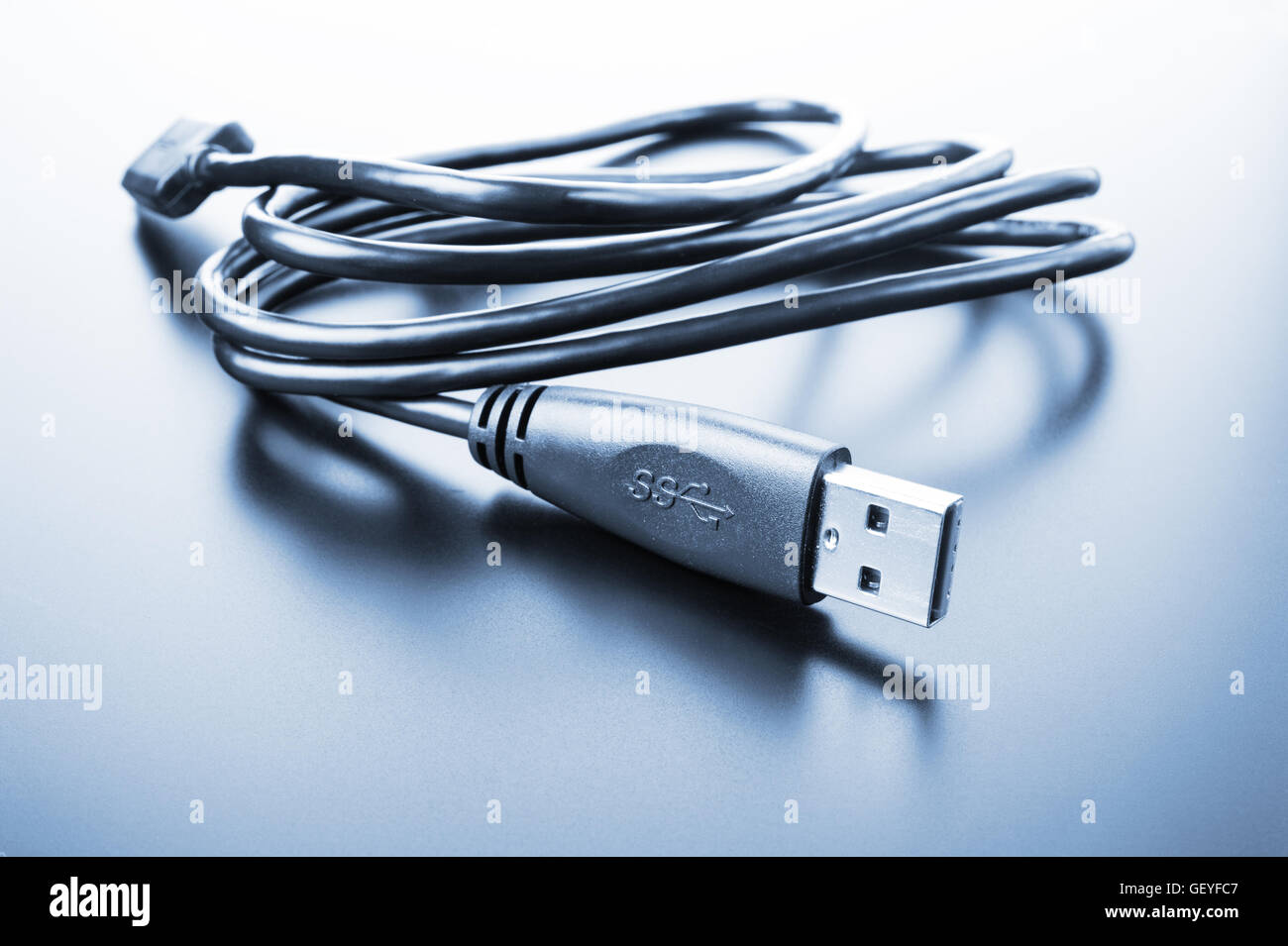 isolated usb 3.0 cable in cyan tone Stock Photo - Alamy