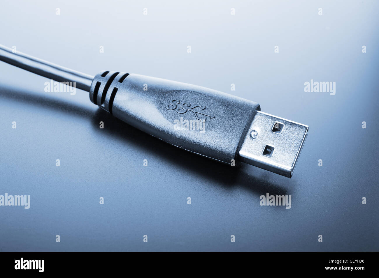 isolated usb 3.0 cable in cyan tone Stock Photo - Alamy