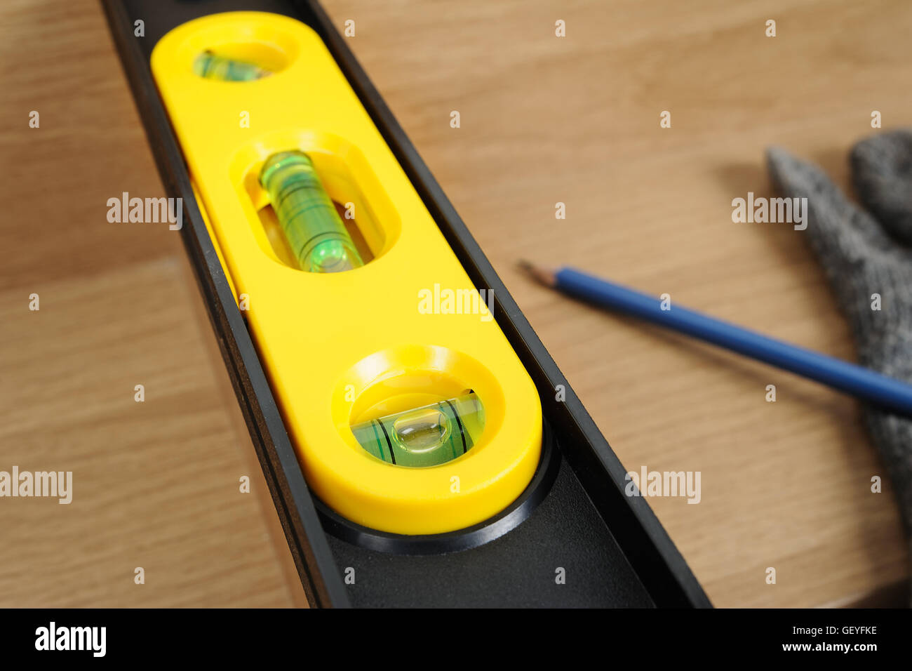 closeup spirit level on wooden furniture Stock Photo - Alamy