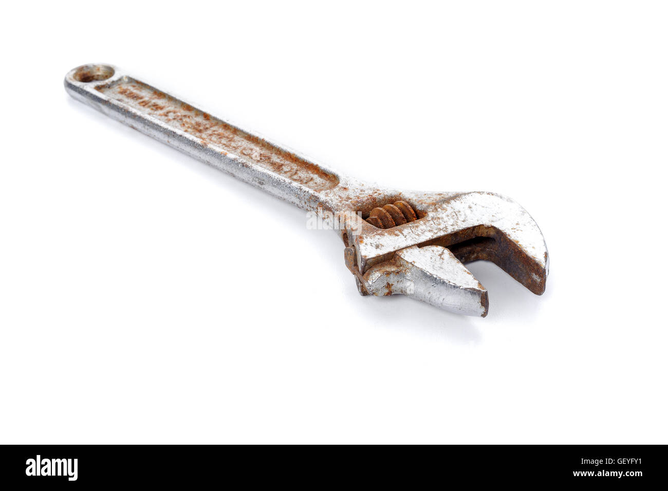 rusty adjustable wrench on white background Stock Photo - Alamy