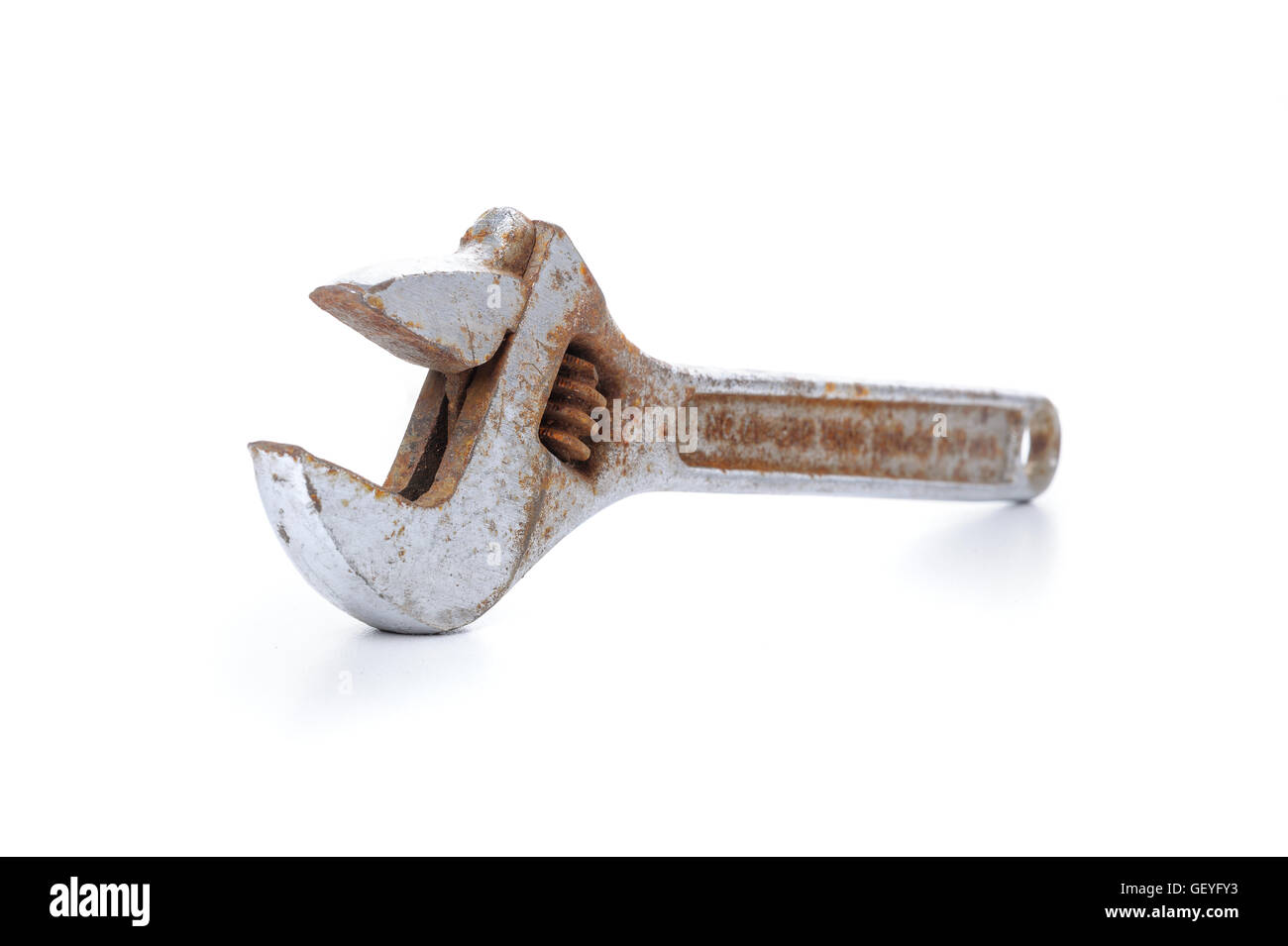 rusty adjustable wrench on white background Stock Photo - Alamy