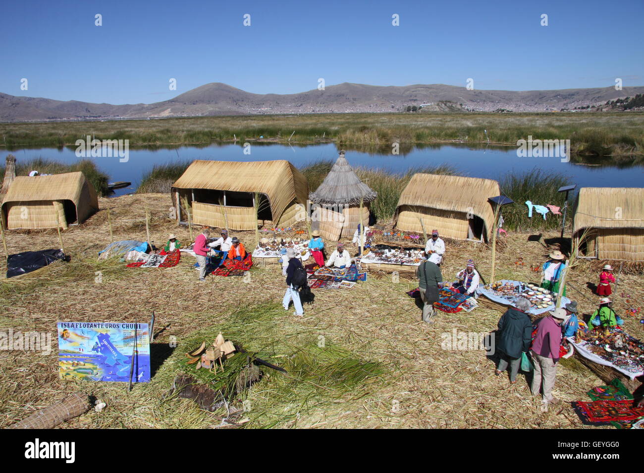 Floating reed village on Lake Titicaca, Peru, with Uros villagers and ...