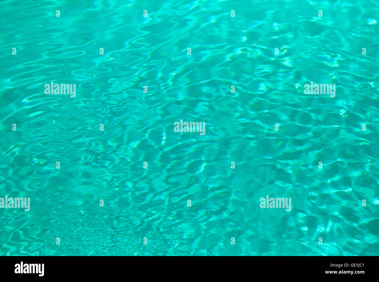 Close-up of crystal clear blue pool water Stock Photo - Alamy