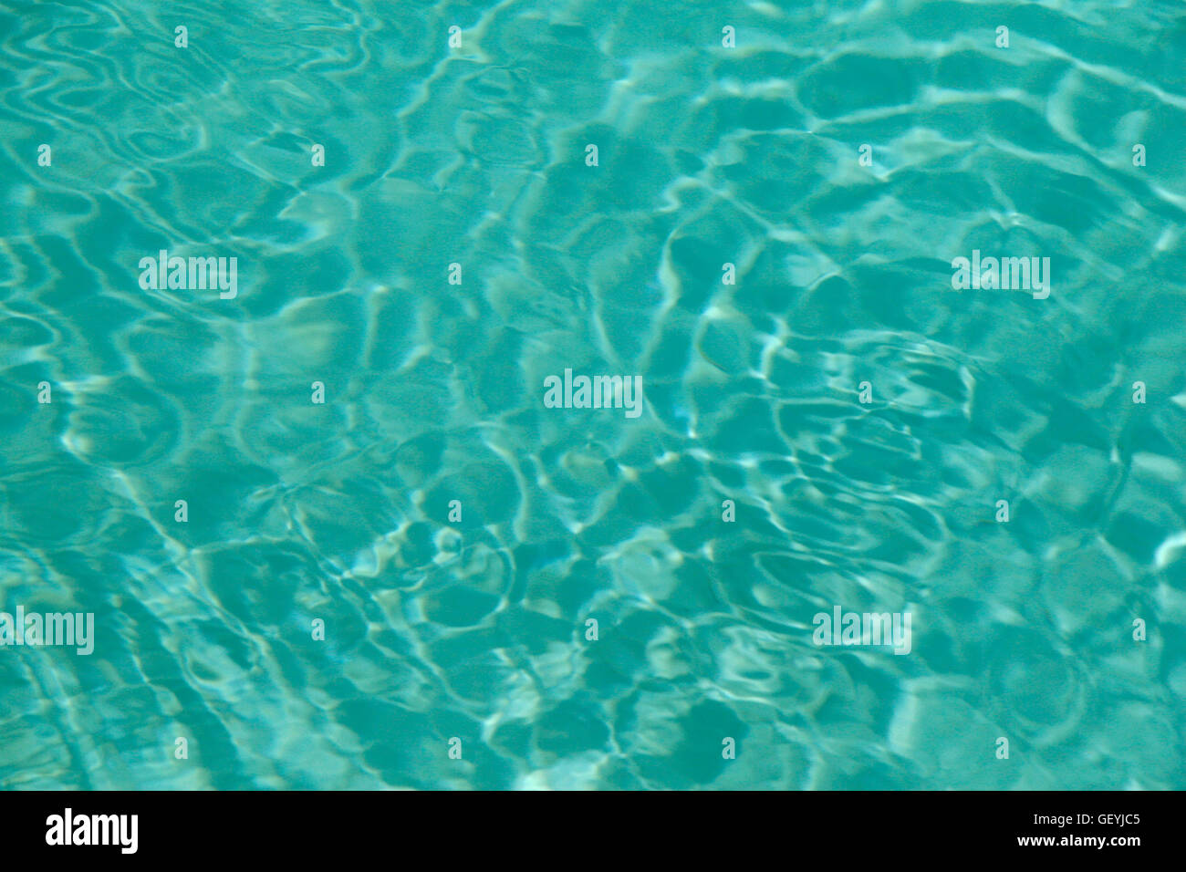Close-up of crystal clear blue pool water Stock Photo - Alamy