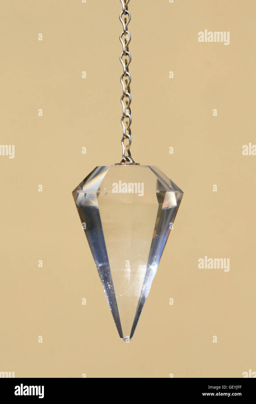 Quartz crystal, quartz, clear quartz, pendulum Stock Photo - Alamy