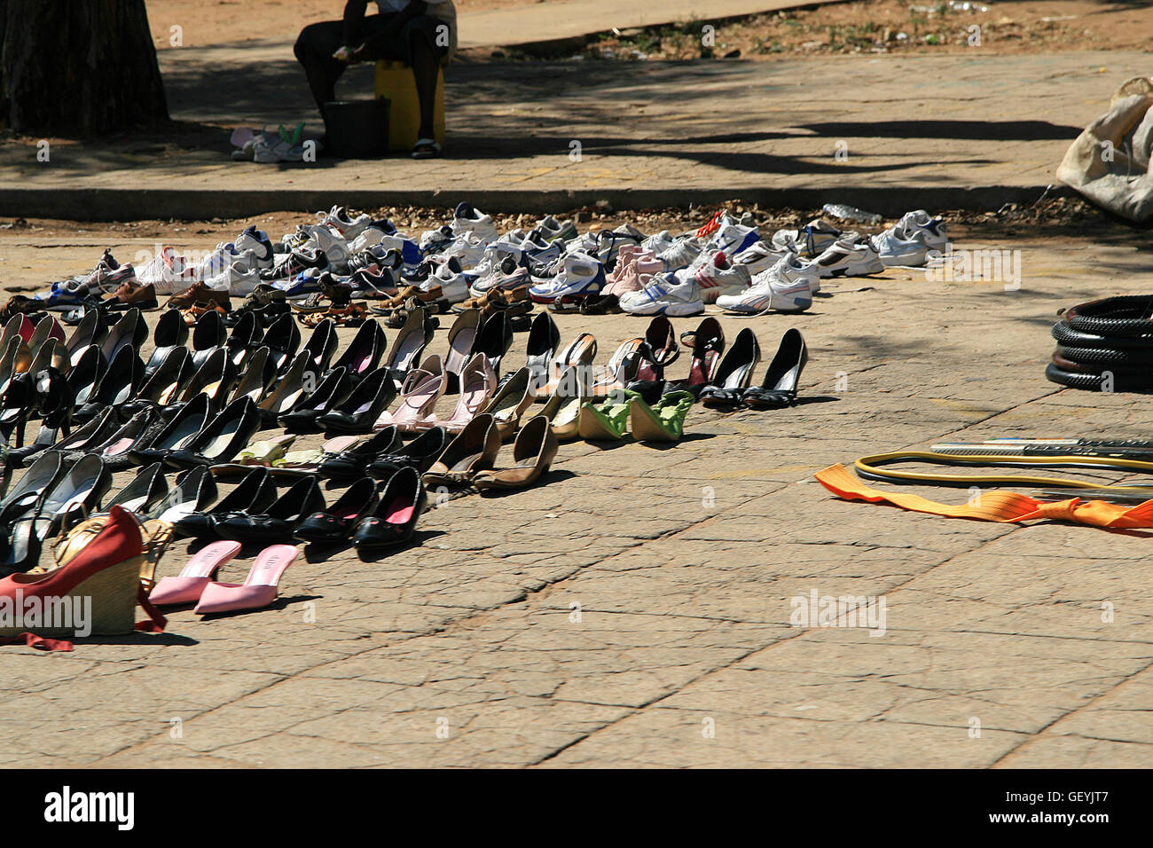 Street vendors selling women's shoes, Maputo, Mozambique Stock Photo ...