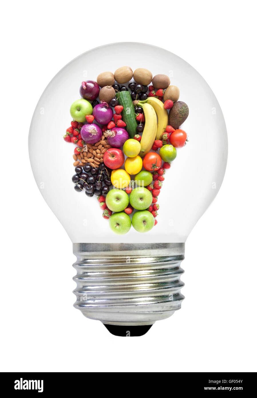 Light bulb containing fruits and vegetables over a white background in ...