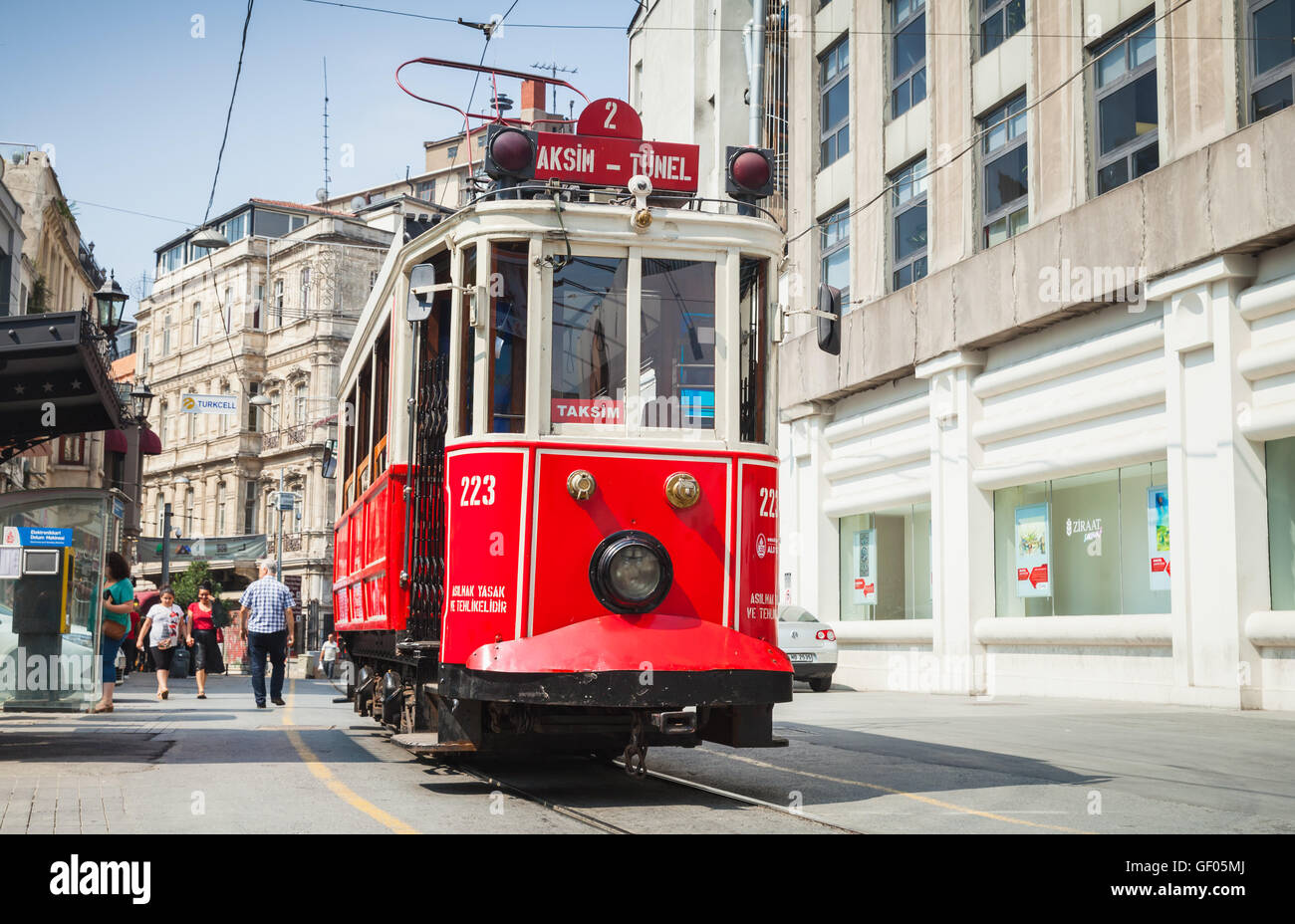 Istanbul, Turkey - July 1, 2016: Old red tram goes on Istiklal street ...