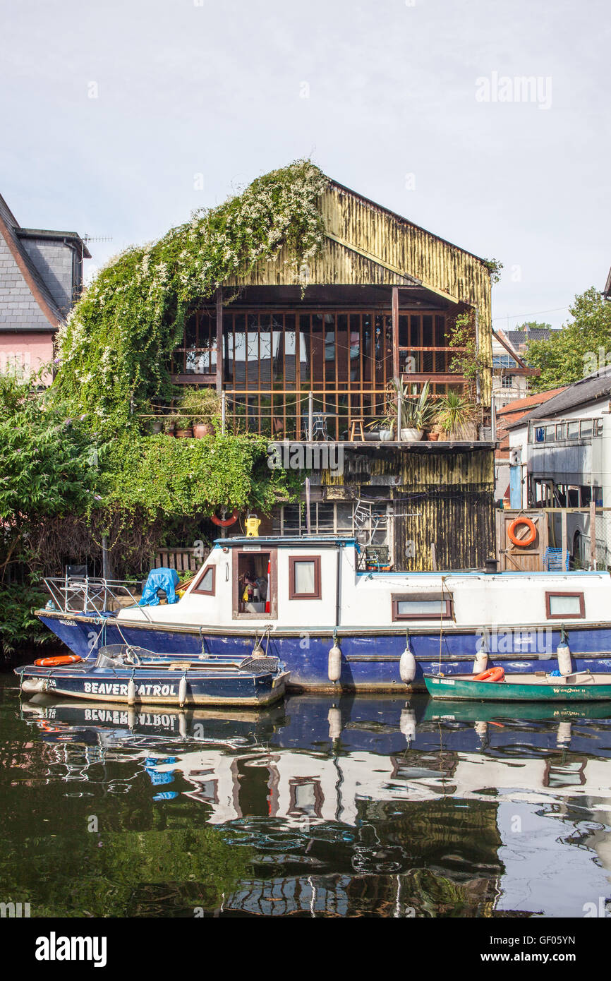 old corrugated industrial building on riverside of river wensum norwich ...