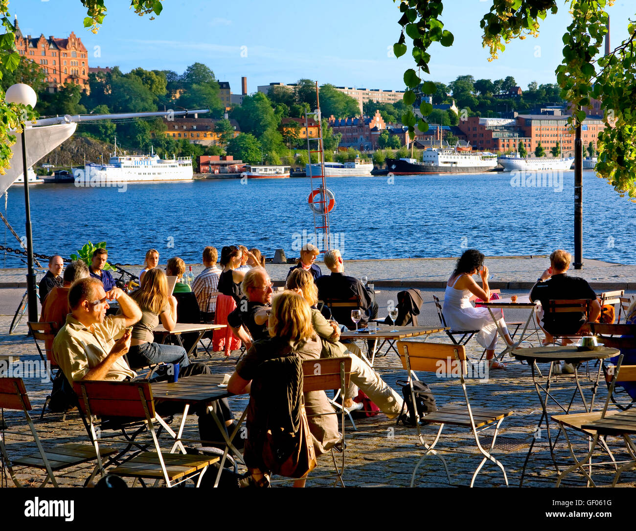 People relaxing in Riddarholmen, Stockholm Stock Photo - Alamy