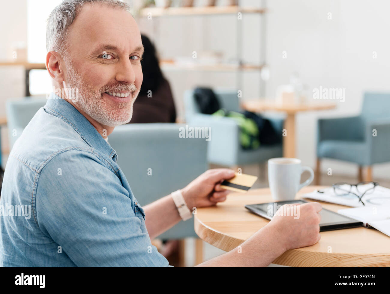 Man being in a cafe Stock Photo - Alamy