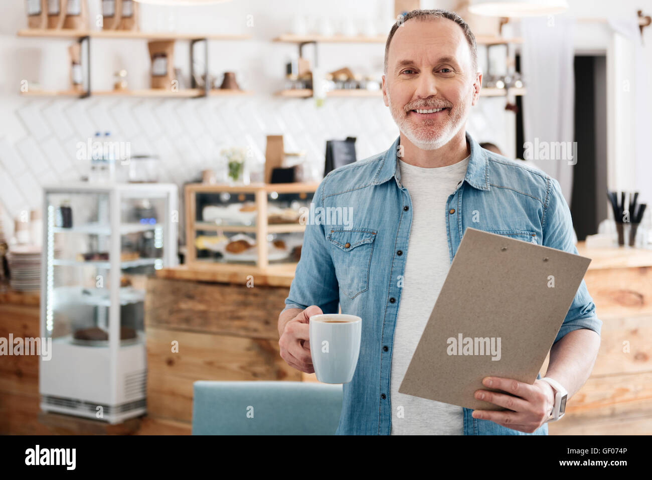 Man being in a cafe Stock Photo - Alamy