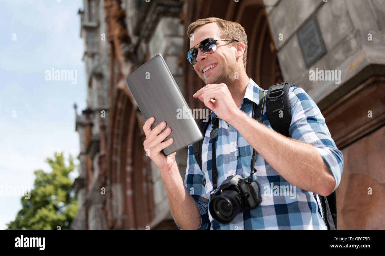 Positive man having a walk Stock Photo - Alamy
