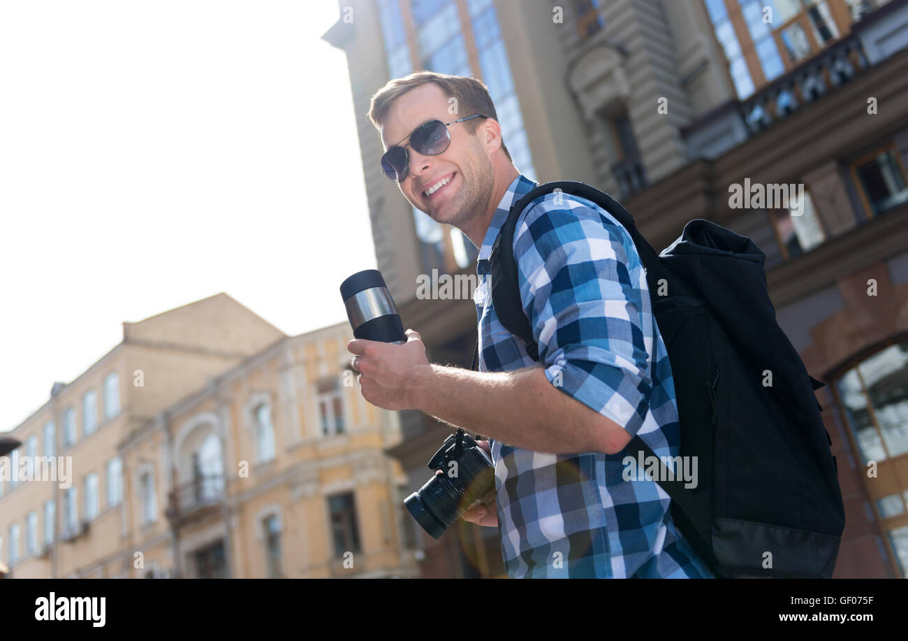Positive handsome man having a walk Stock Photo - Alamy