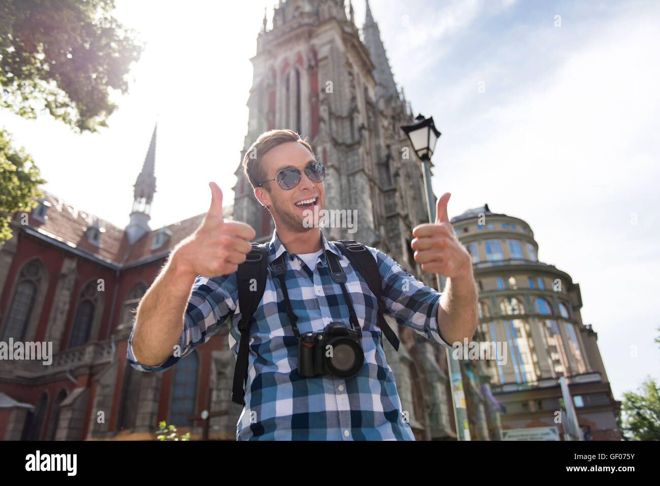 Positive man having a walk Stock Photo - Alamy