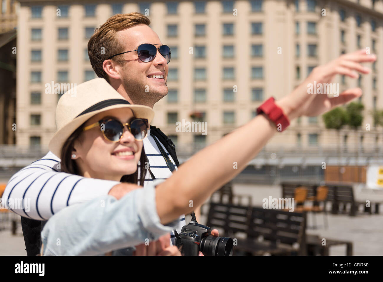 Nice cheerful couple having a walk Stock Photo - Alamy