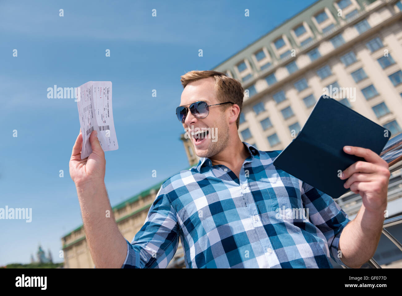 Positive man expressing wonder Stock Photo - Alamy