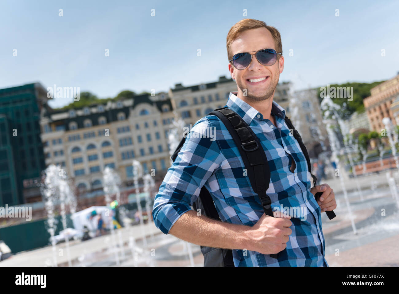 Positive handsome man having a walk Stock Photo - Alamy