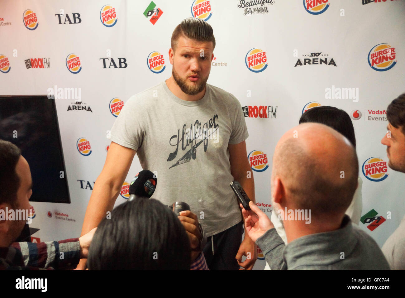Russian heavyweight boxer Alexander Dimitrenko speaks to the media ...