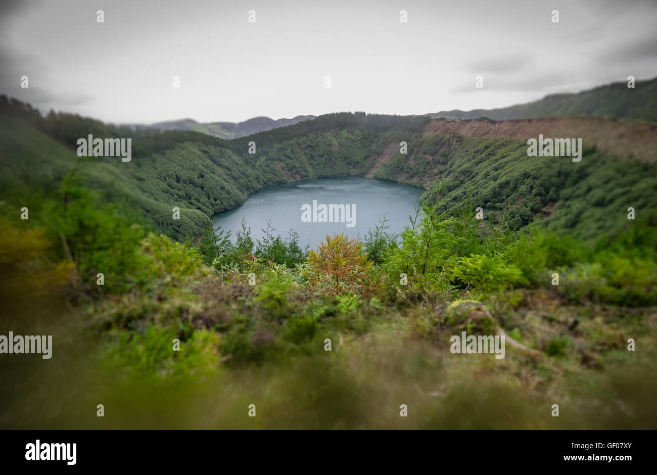 Small volcanic crater lake in Sao Miguel, Azores, Portugal Stock Photo ...