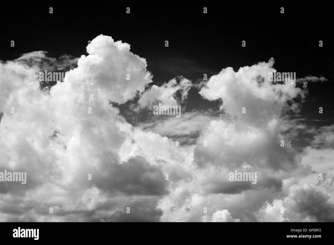 Fluffy sky clouds Black and White Stock Photos & Images - Alamy