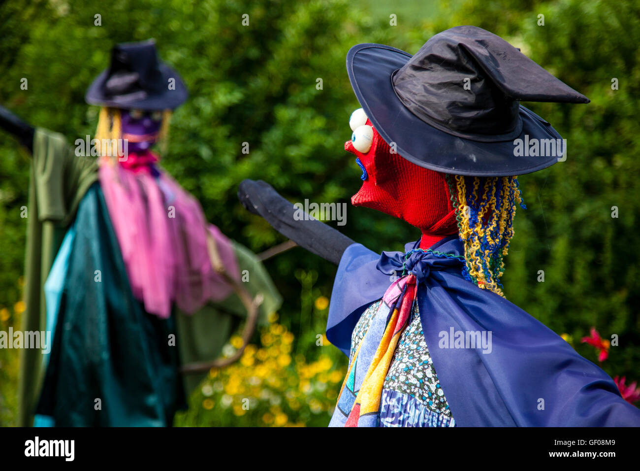 Colourfully Dressed Scarecrows In A Garden, Sussex, UK Stock Photo - Alamy
