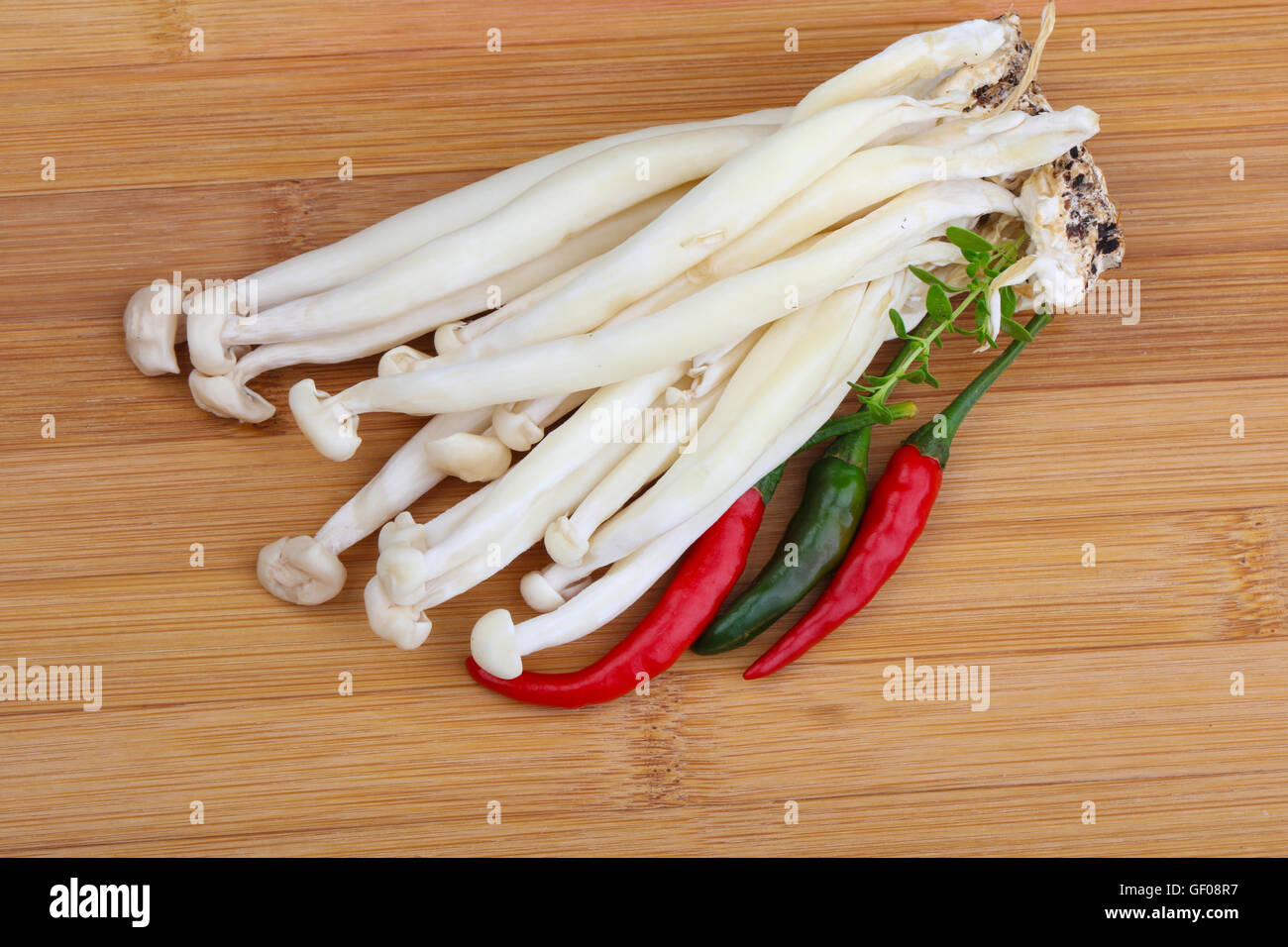 Japanese mushroom - enoki raw food ready for cooking Stock Photo - Alamy