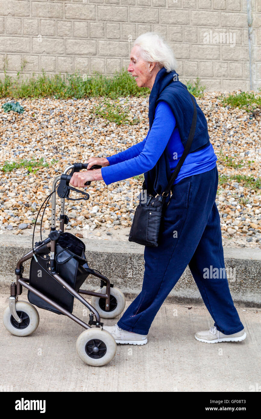 An Elderly Woman Walking With A Rollator Walking Aid, Rottingdean ...