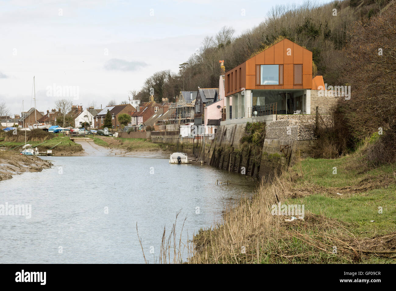 Exterior view along river to show south facade. South Street, Lewes ...