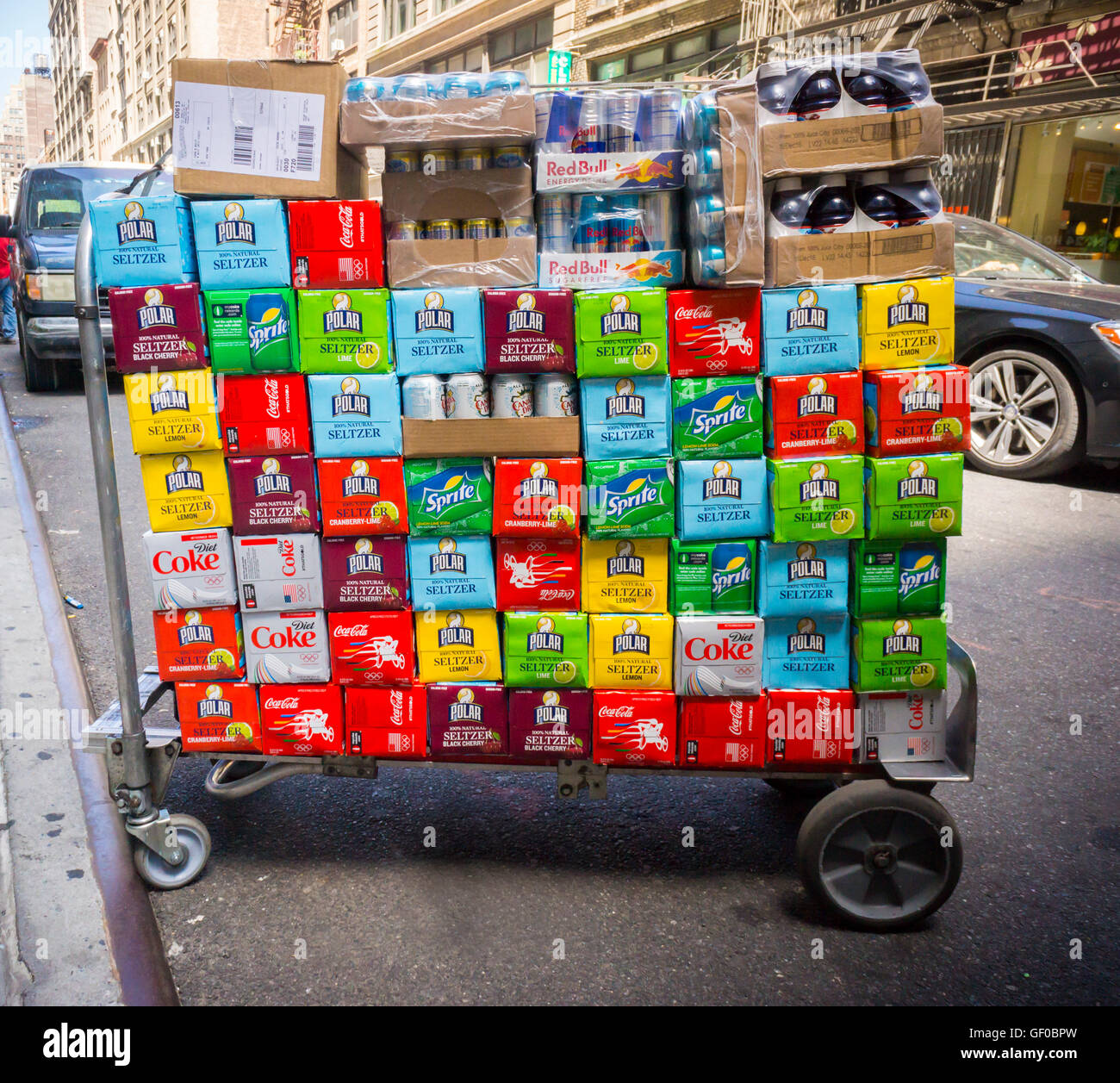A distributor prepares a delivery of soft drinks and other beverages in ...