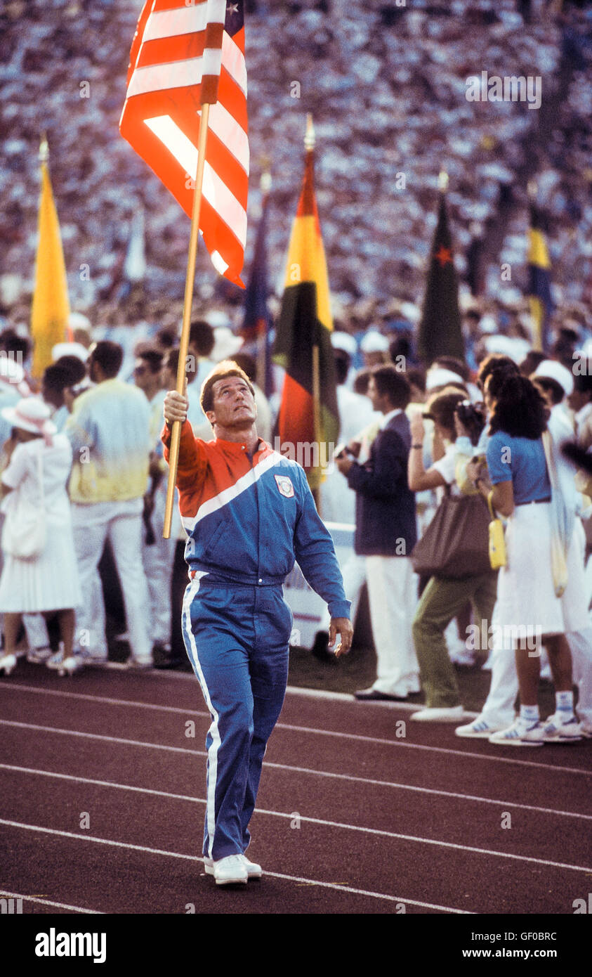 Ed Burke is flag-bearer for US team during opening ceremonies at 1984 ...