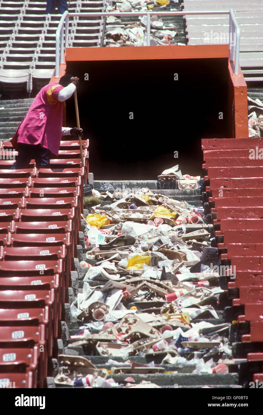Workers cleaning up trash at L.A. Memorial Coliseum during 1984 Olympic ...