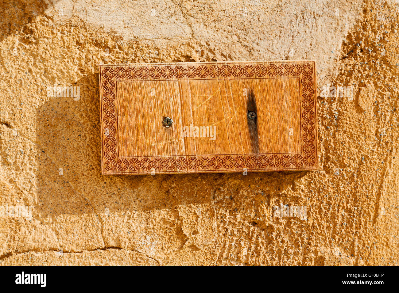 in a concrete wall the wooden vintage empty panel blank and abstract ...