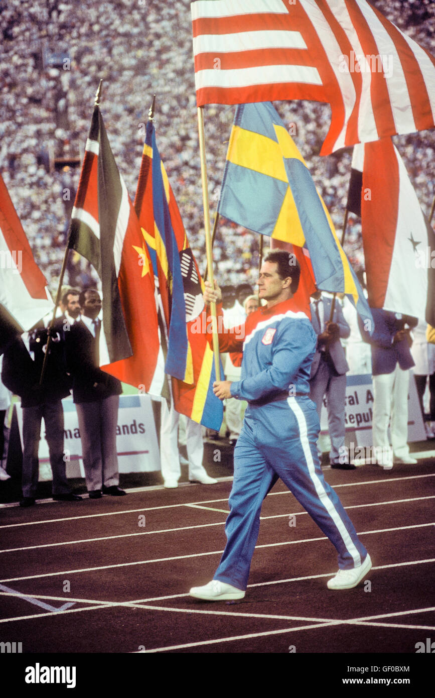 Ed Burke is flag-bearer for US team during opening ceremonies at 1984 ...