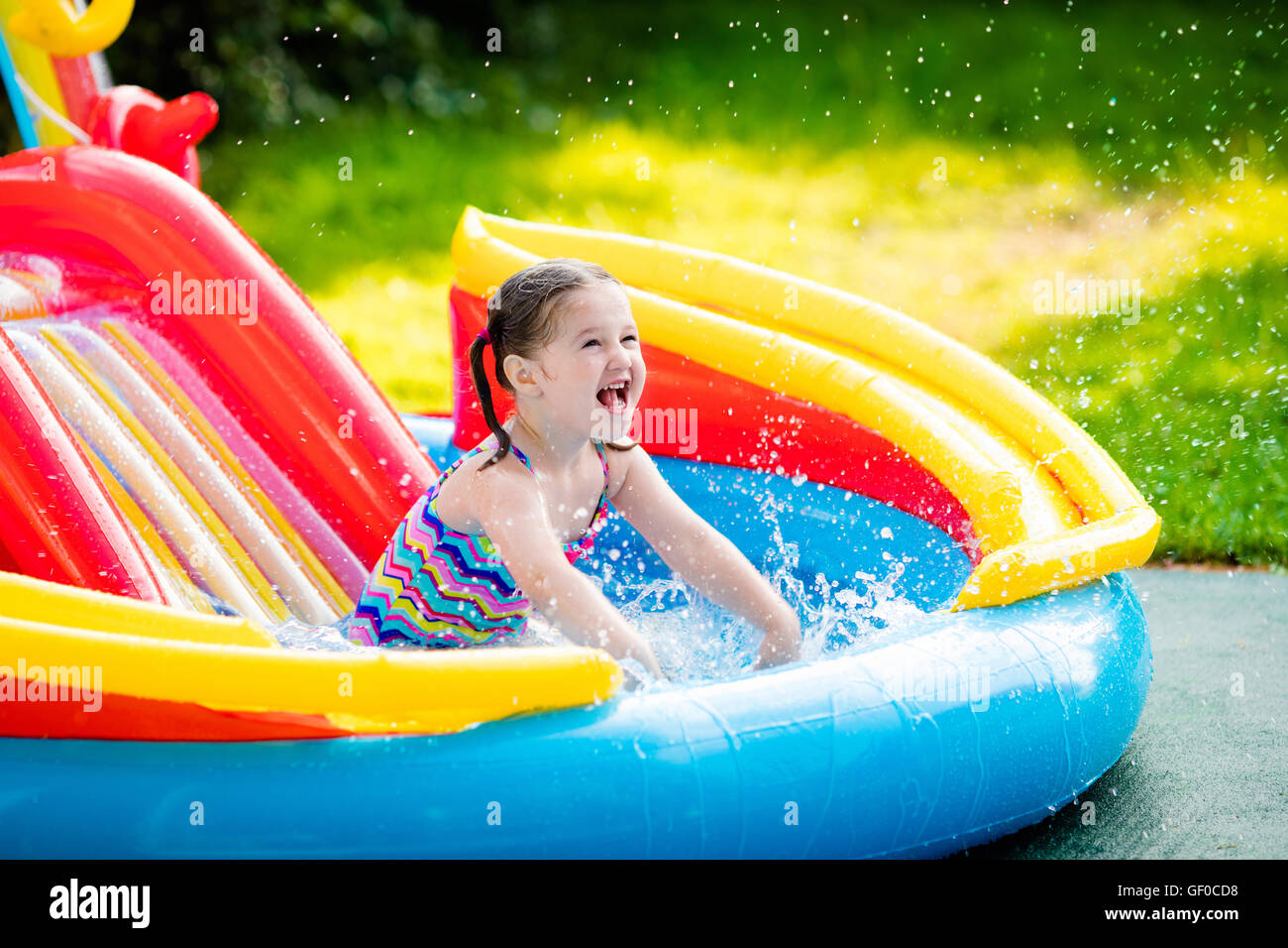 Blue swimsuit kids hi-res stock photography and images - Alamy