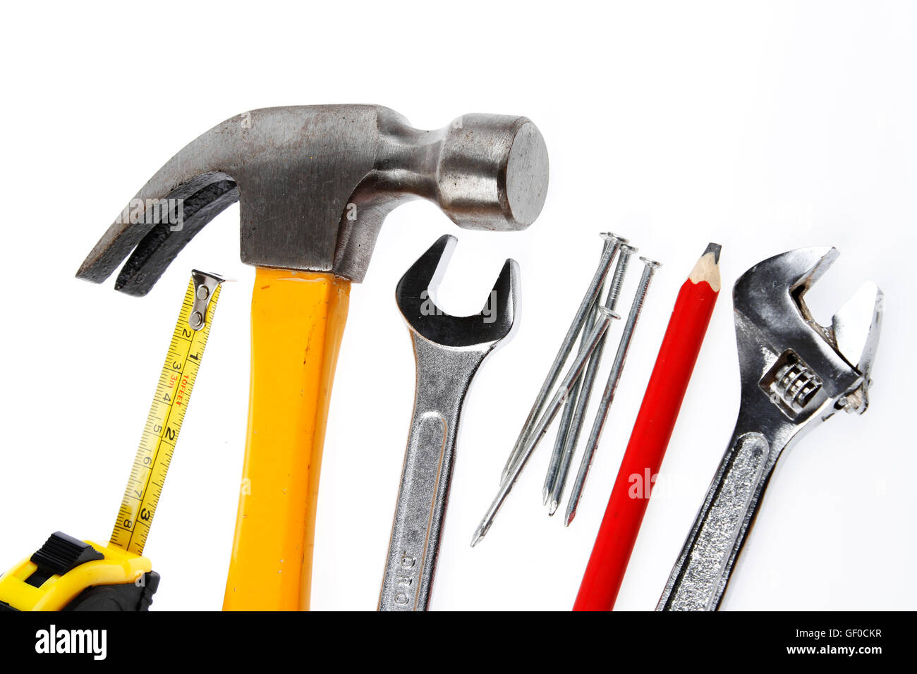 Assortment of tools on plain background Stock Photo - Alamy