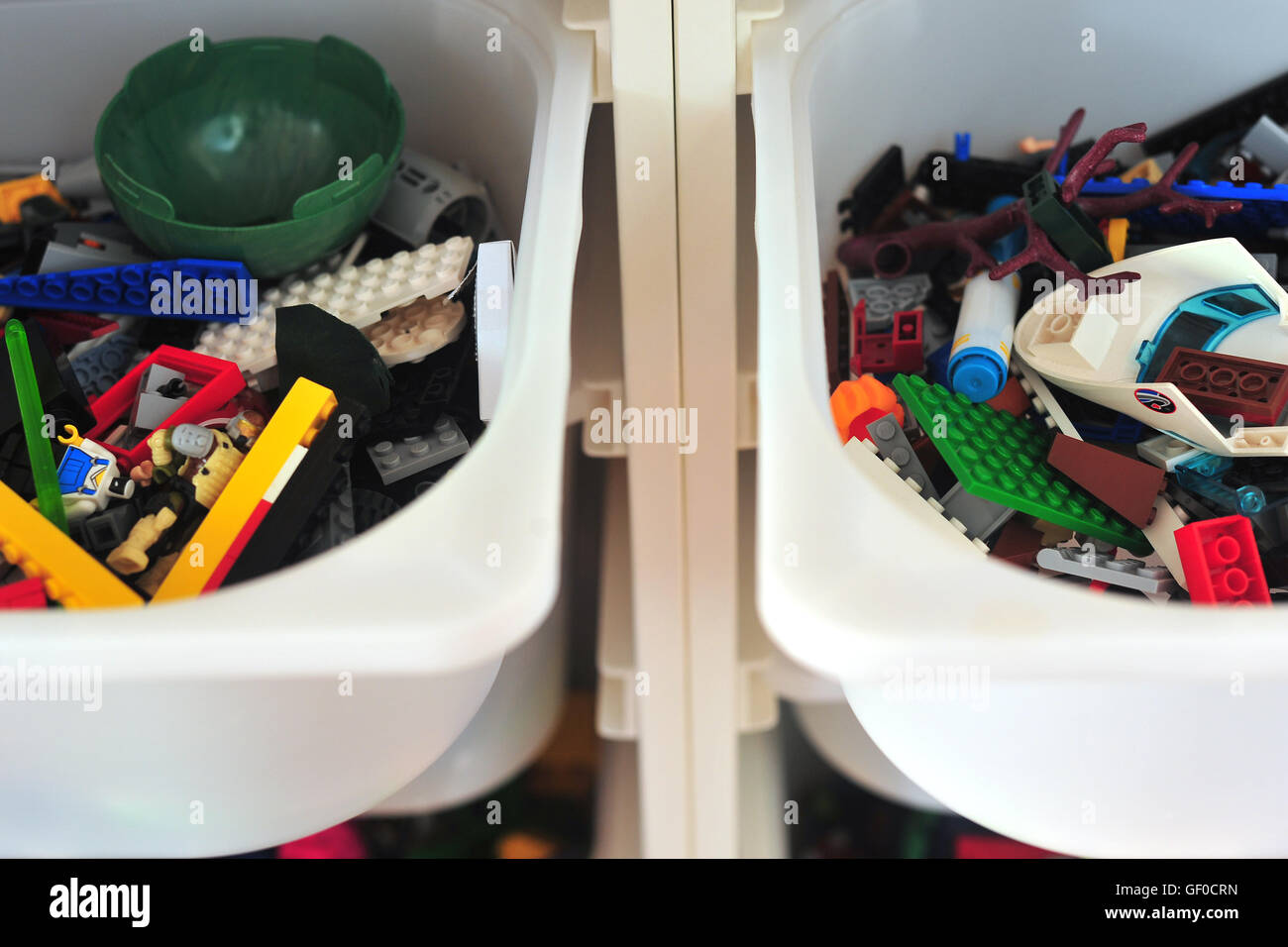 Containers of Lego pieces in a child's bedroom Stock Photo - Alamy