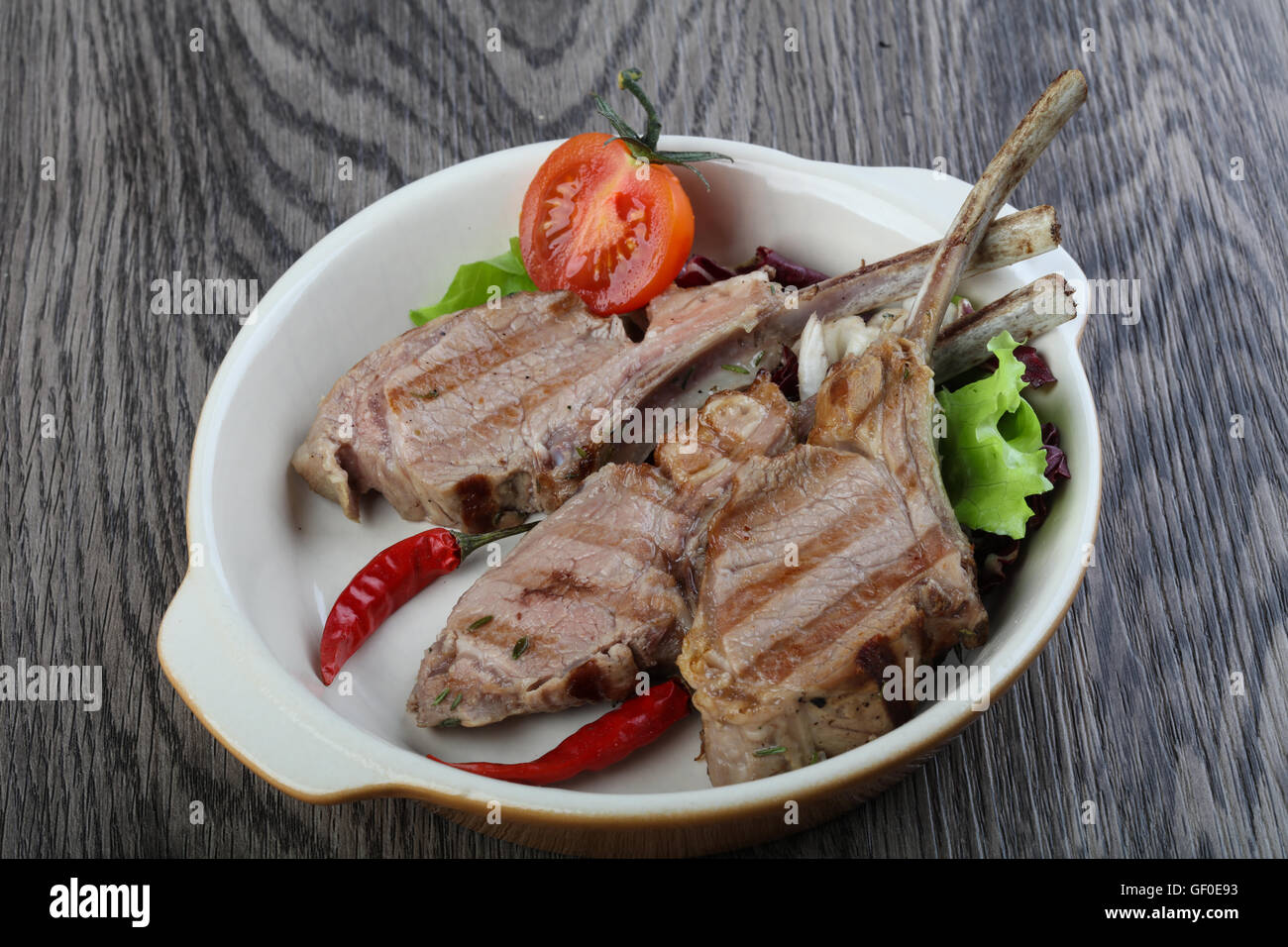 Lamb Frenched Rack grilled rib bone Stock Photo - Alamy