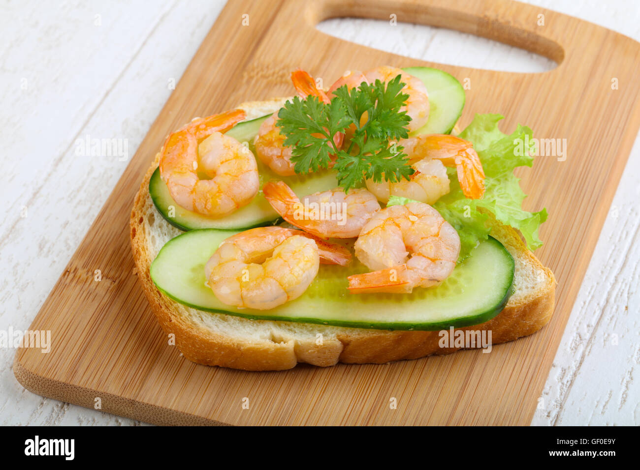 Sandwich with cucumbers and prawn serwed parsley Stock Photo - Alamy