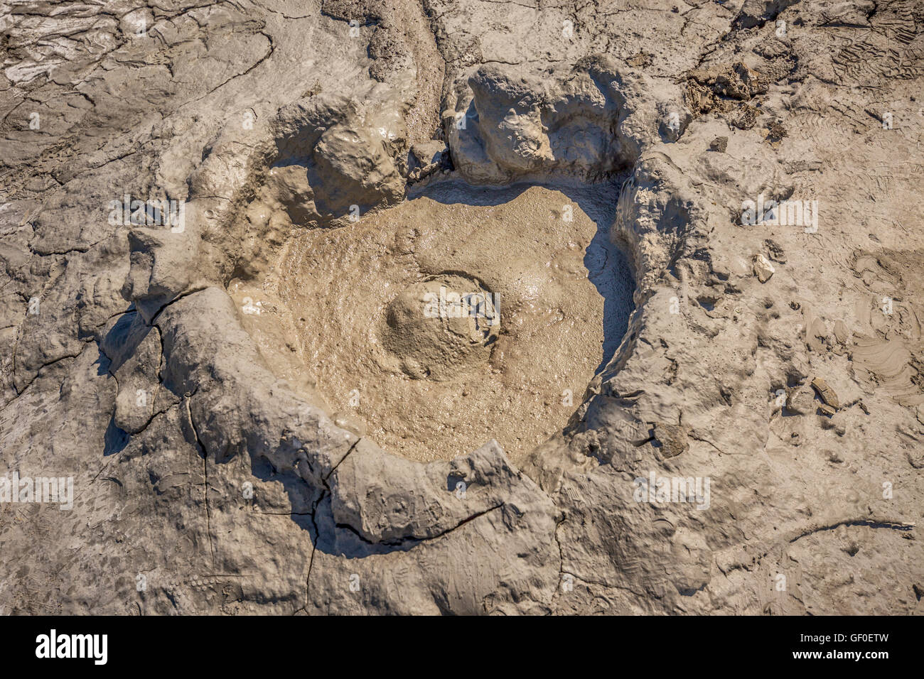 Earth gas reaches the surface through hills making small Mud volcanoes ...