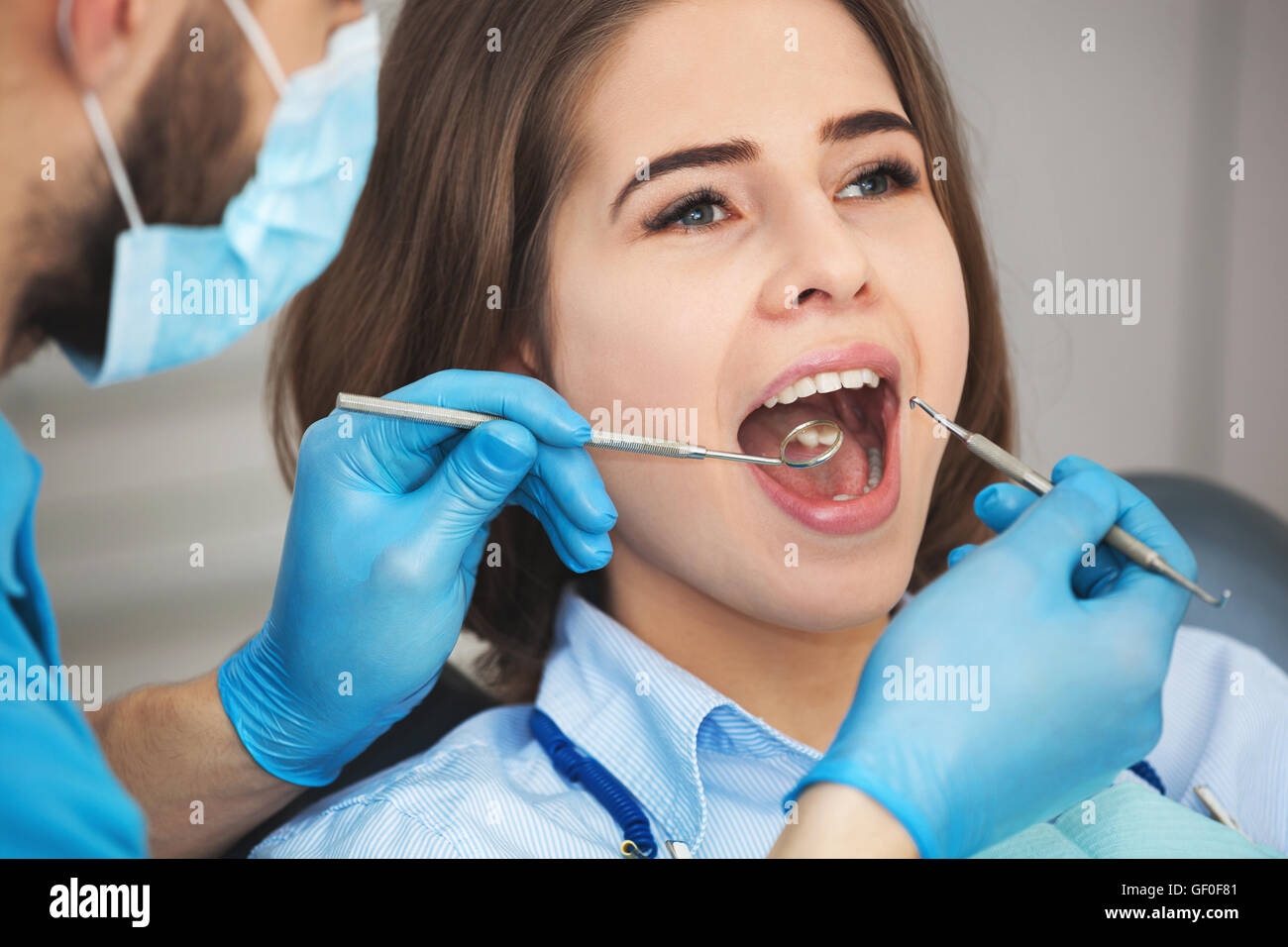 Man getting teeth operation hi-res stock photography and images - Alamy