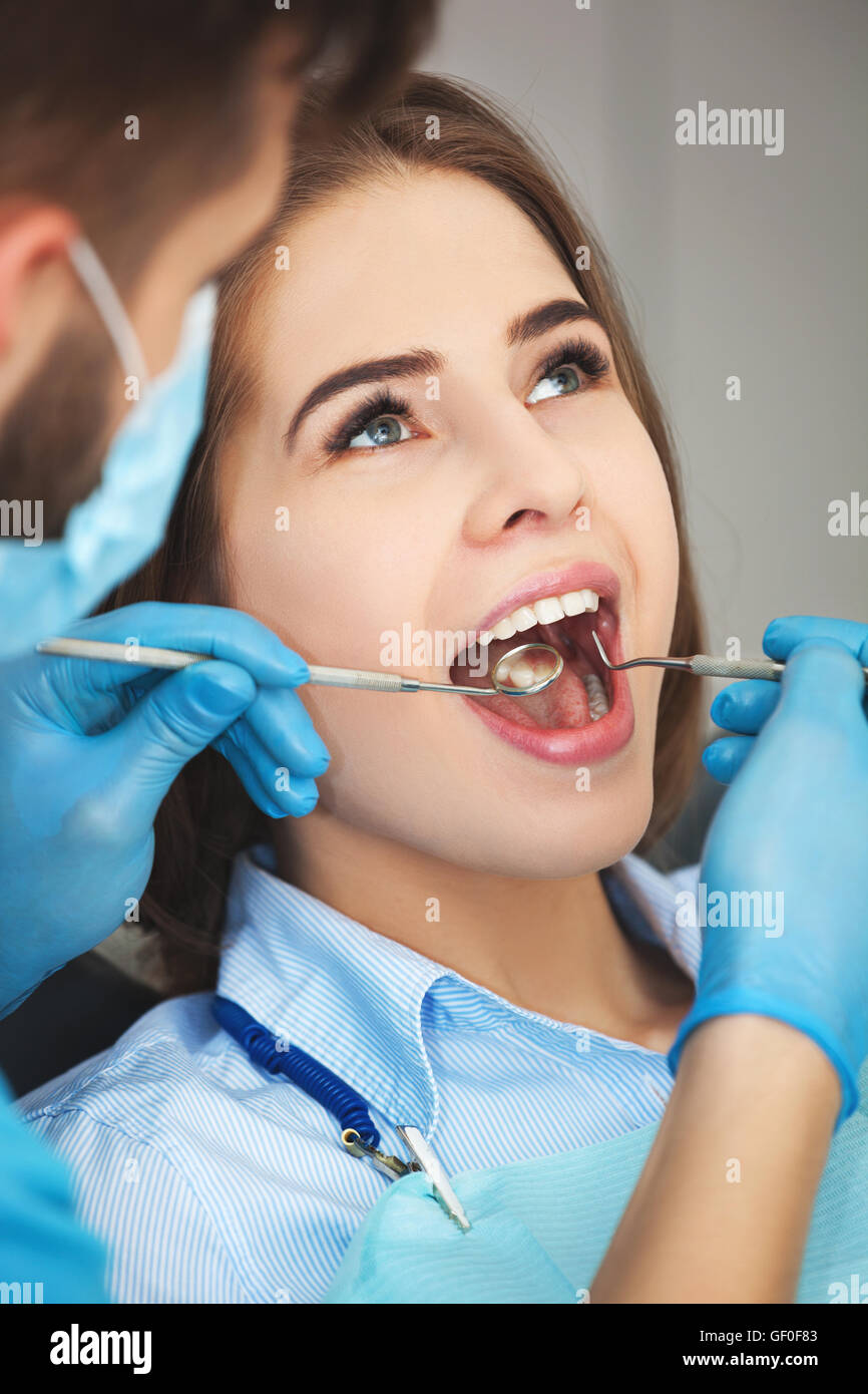 Getting teeth checked hi-res stock photography and images - Alamy