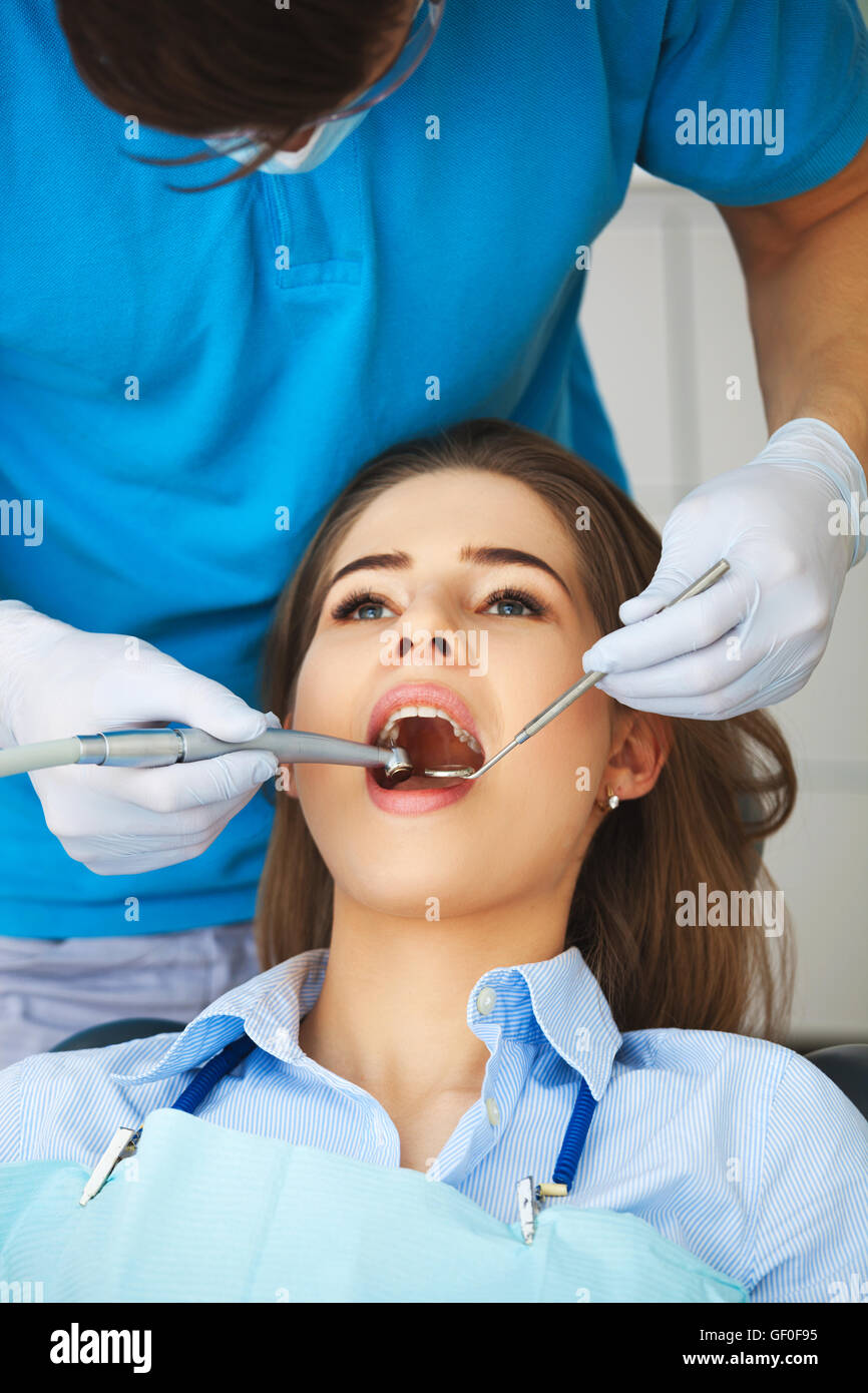 Inspecting teeth hi-res stock photography and images - Alamy