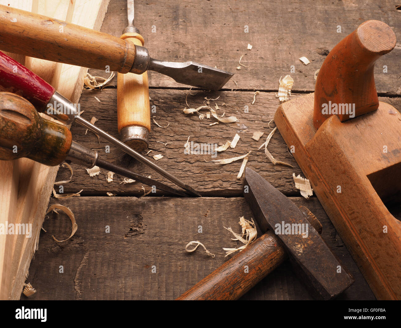 Old used carpenter tools on a workbench Stock Photo - Alamy