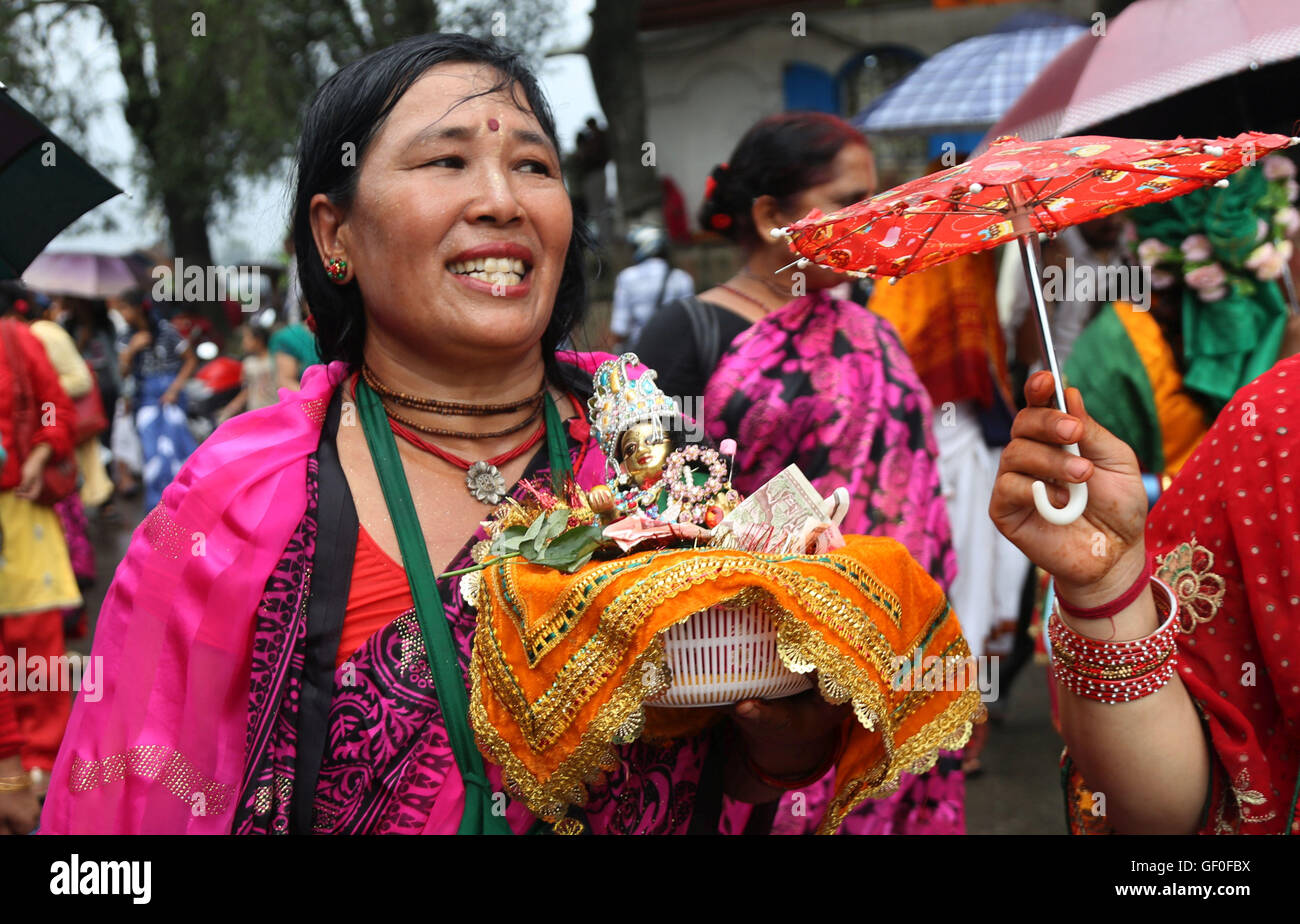 Devotees participate in the pulling of the chariot of Lord Jagannath ...
