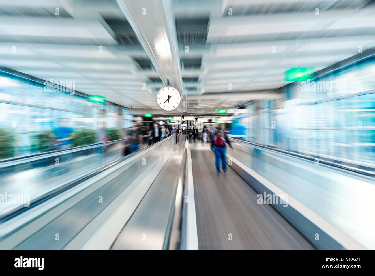 Airport terminal interior moving walkway. Fast motion blur effect. Time ...
